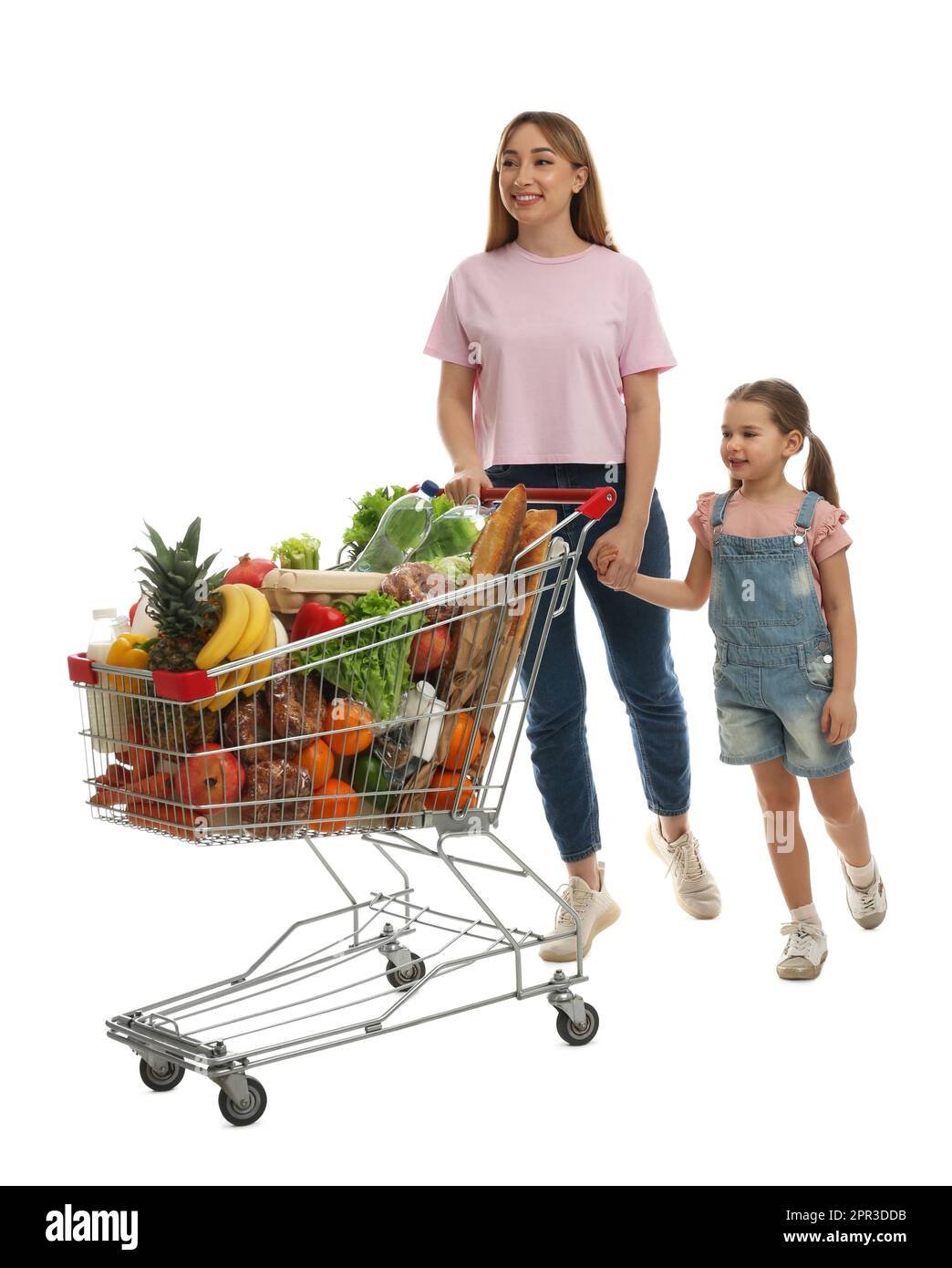 Mother and daughter with full shopping cart on white background Stock ...