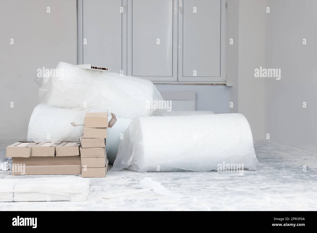 Building materials in room prepared for renovation Stock Photo - Alamy