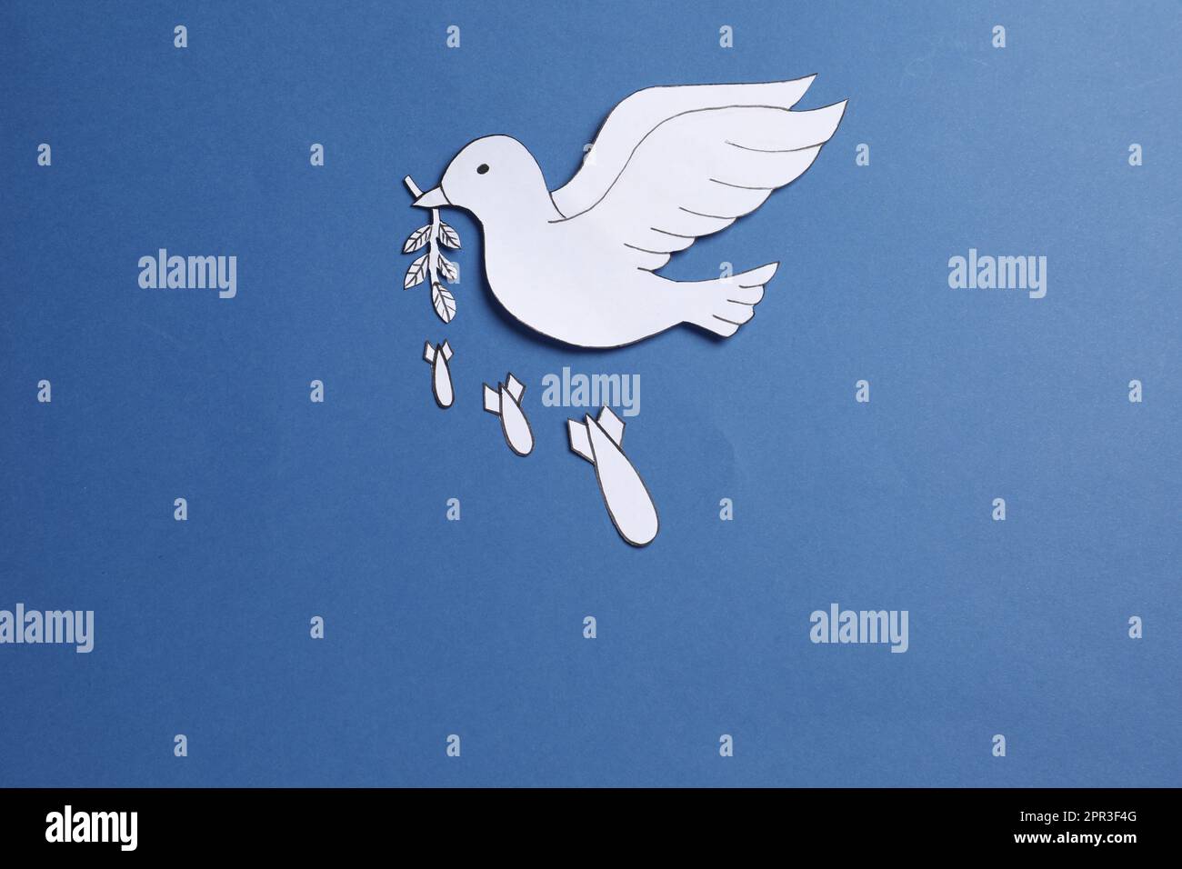 White paper dove with olive branch and bombs on blue background, flat ...
