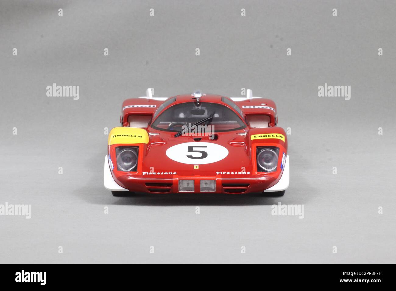 a red race car with white numbers and a number on it and toy Stock ...