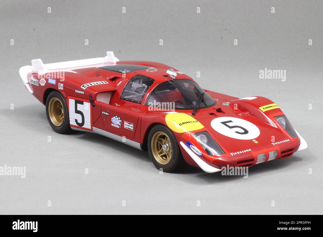 a red race car with white numbers and a number on it and toy Stock ...