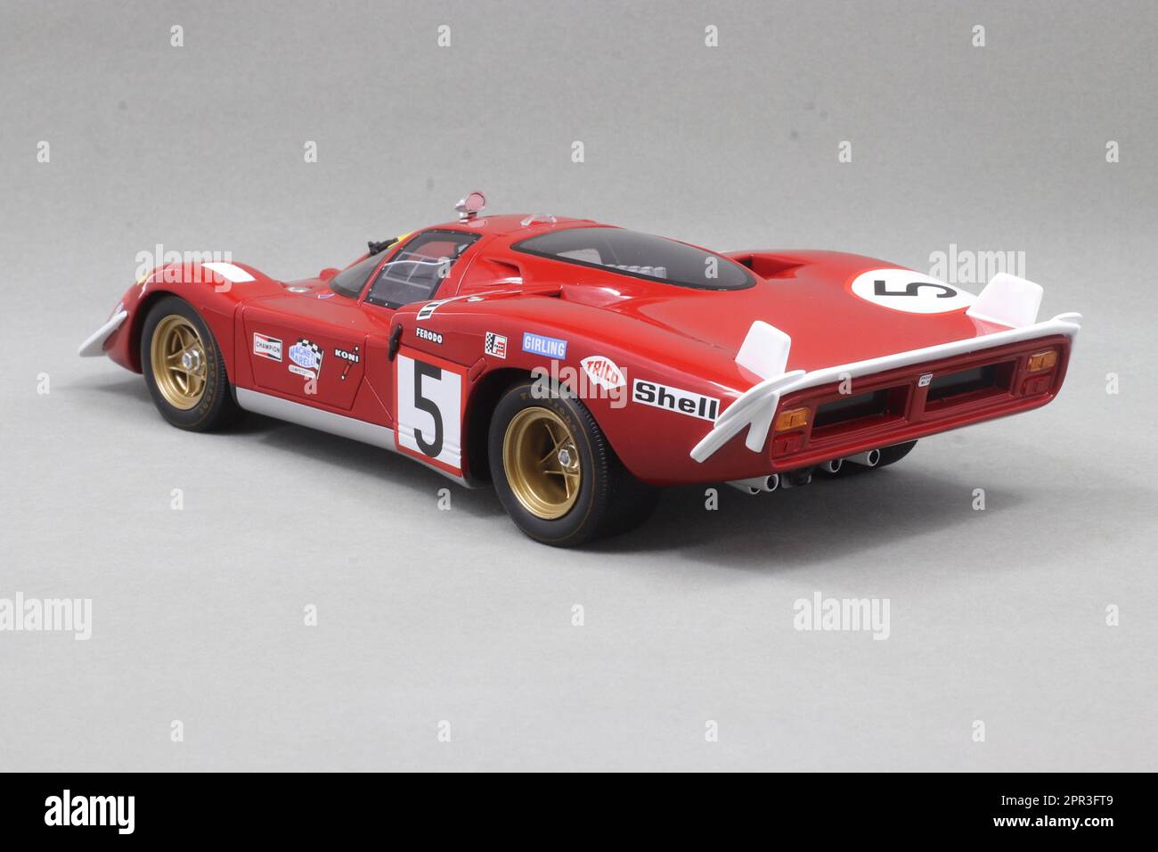 a red race car with white numbers and a number on it and toy Stock ...