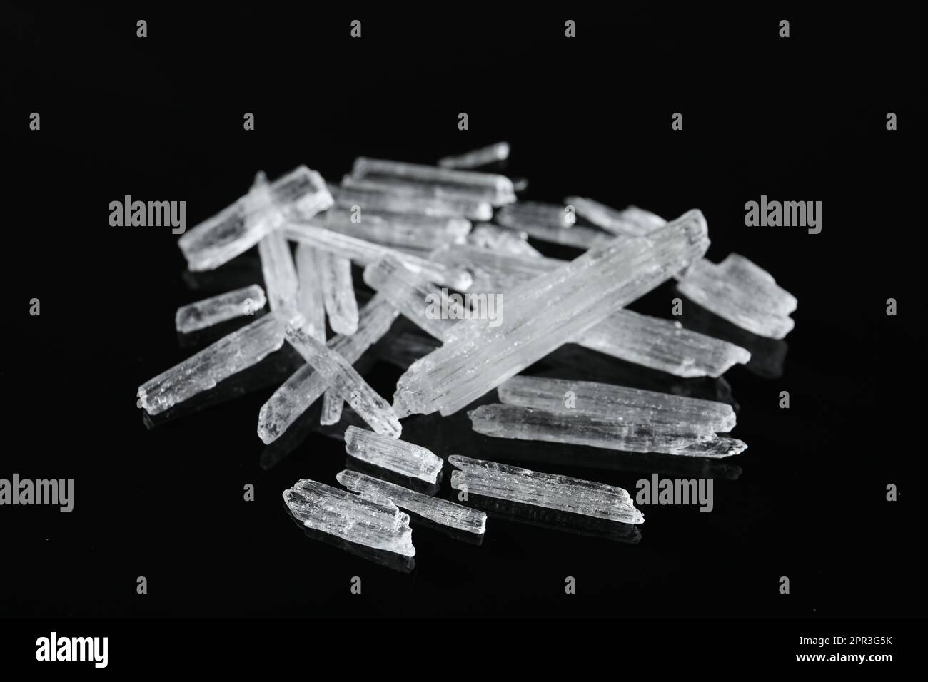 Menthol crystals on black background, closeup view Stock Photo - Alamy