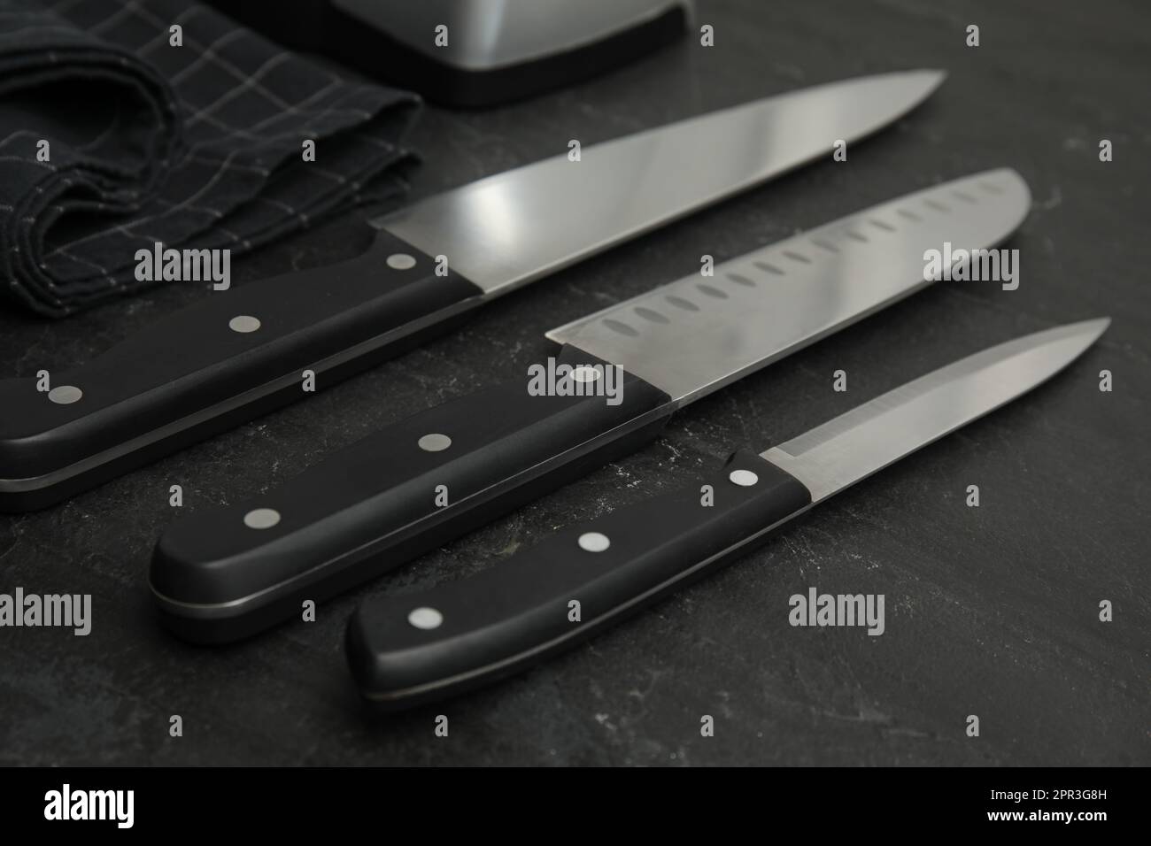 Set knives on table hi-res stock photography and images - Alamy