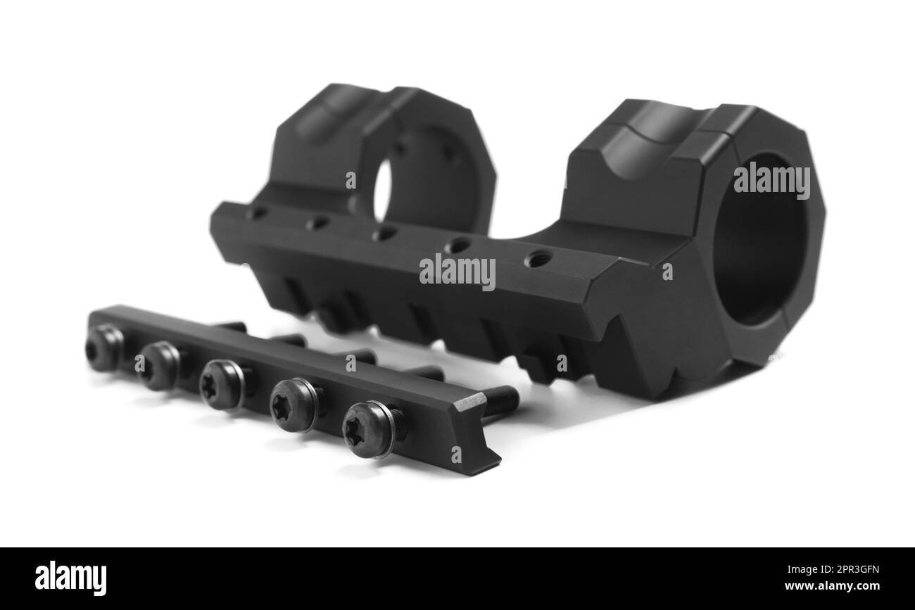 Disassembled quick disconnect sniper cantilever scope mount on white ...