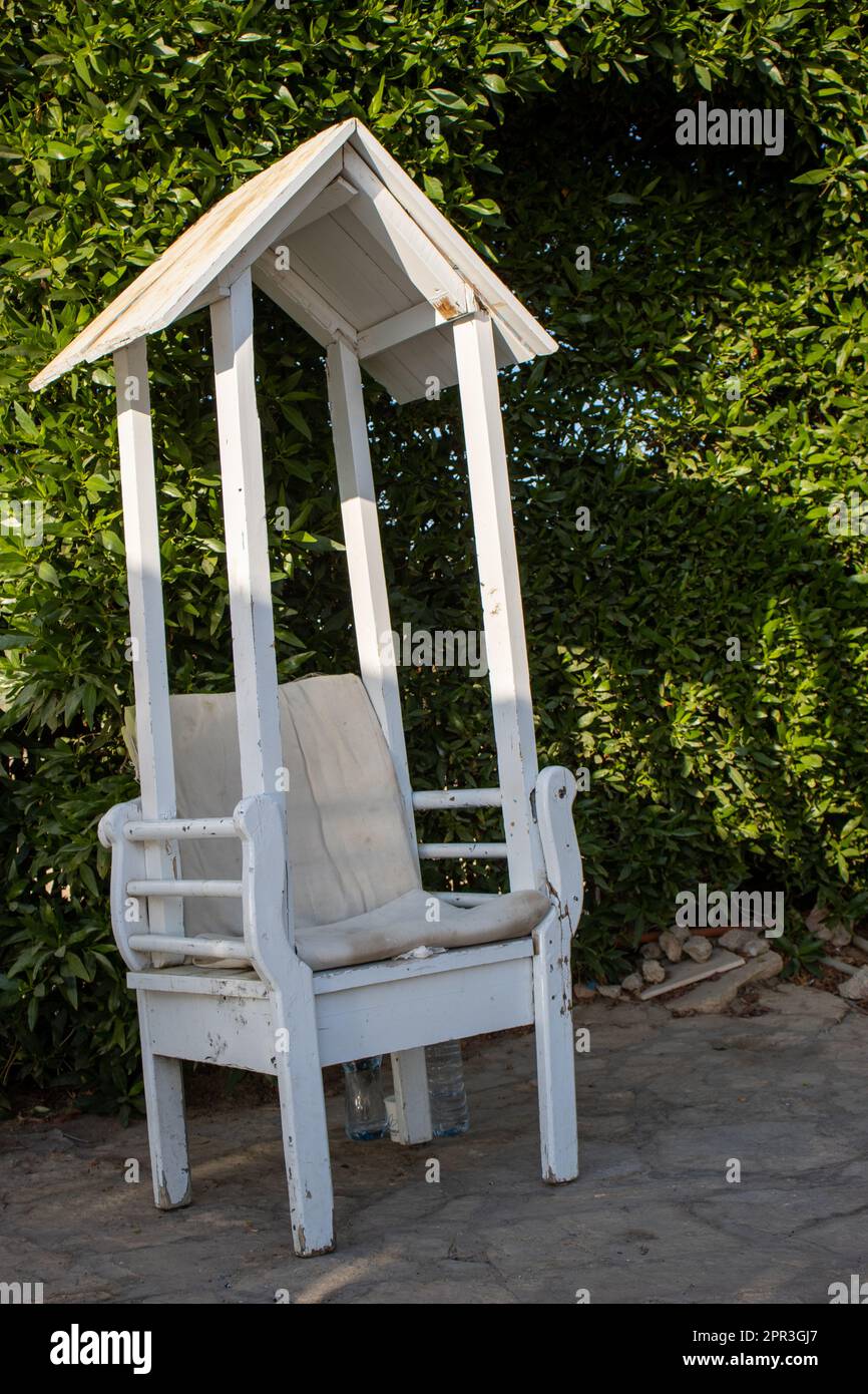 traditional wooden roofed chair for a watchmen Stock Photo - Alamy