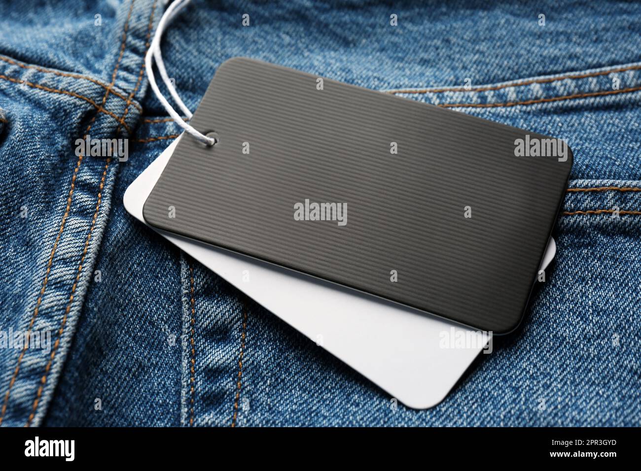 Blue jeans tags hi-res stock photography and images - Alamy