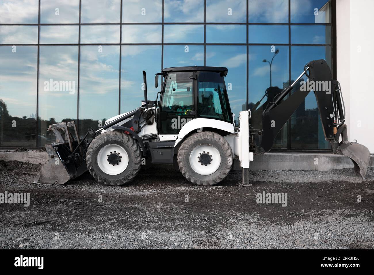 Modern skid loader on construction site outdoors Stock Photo - Alamy