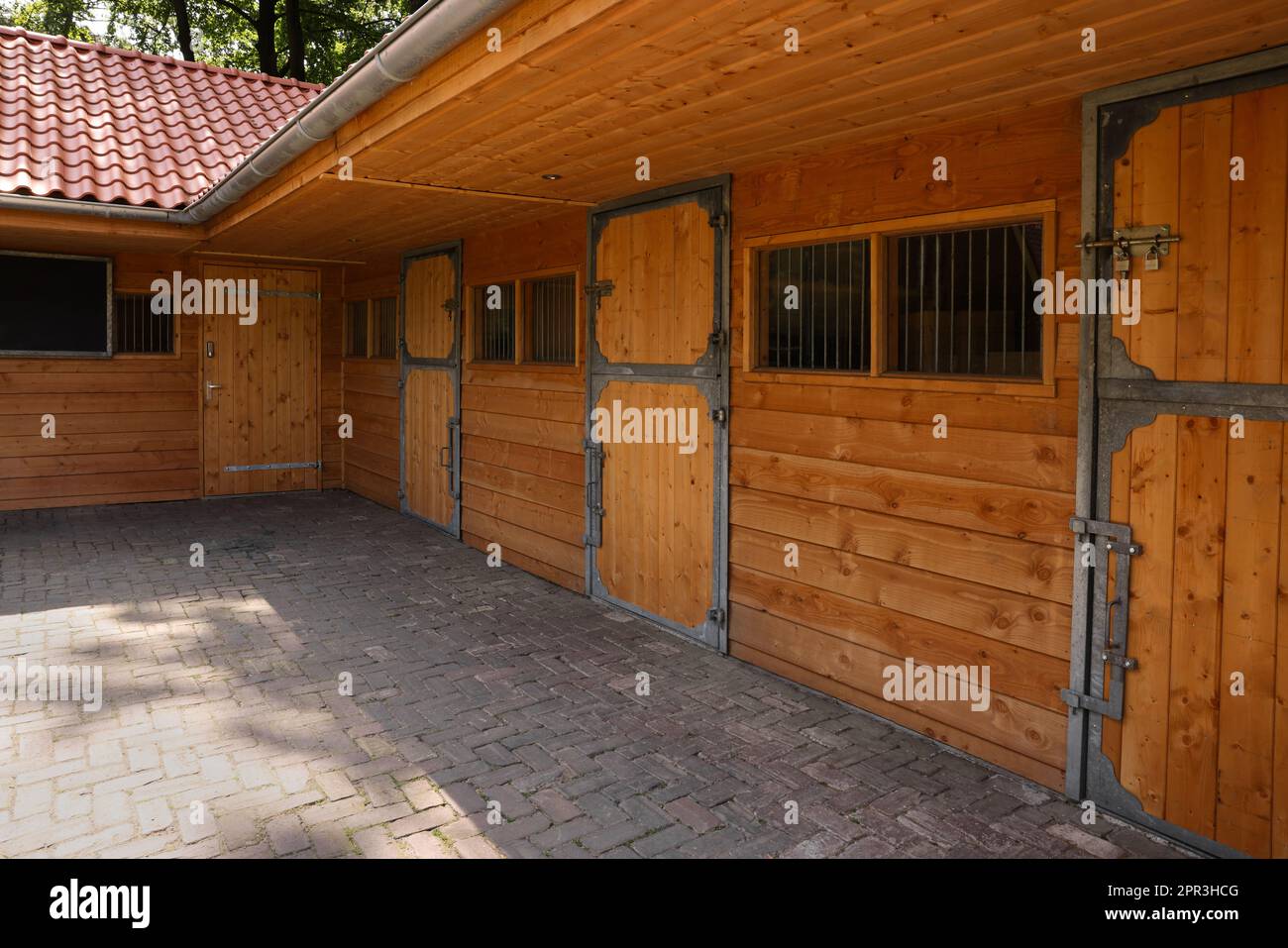 Beautiful wooden horse stable in farm outdoors Stock Photo - Alamy