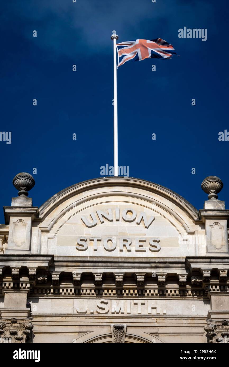 British Union Jack flag flying above a Victorian warehouse in Oamaru ...