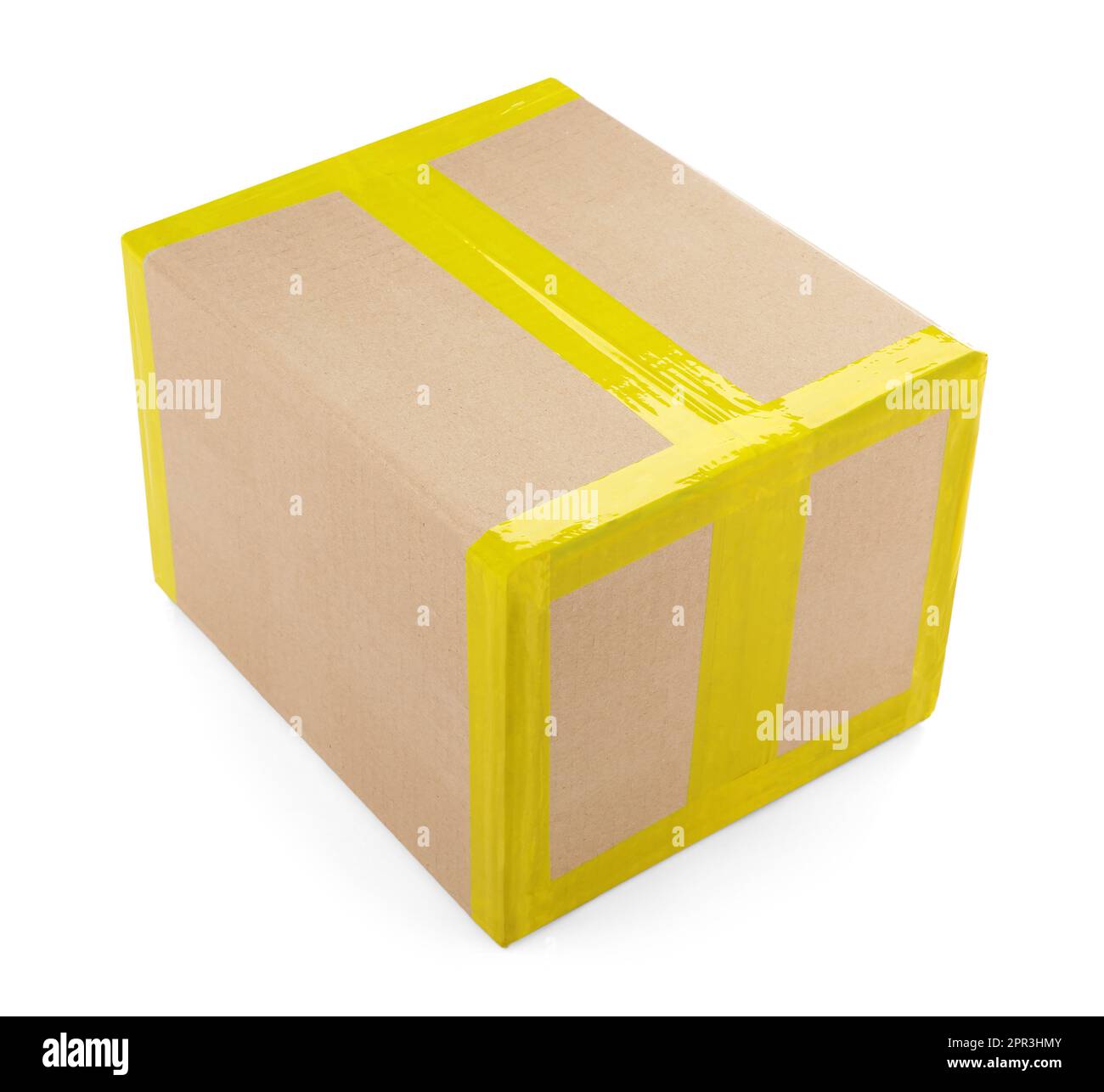 Cardboard parcel box with yellow sticky tape on white background Stock ...