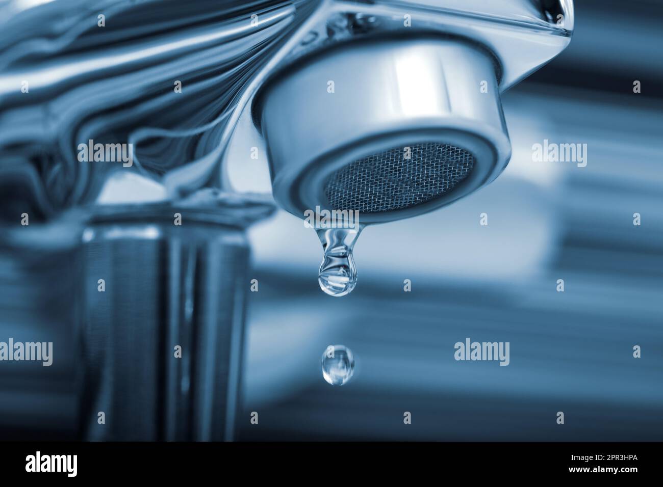 Water drops falling down from tap on blurred background, closeup Stock ...