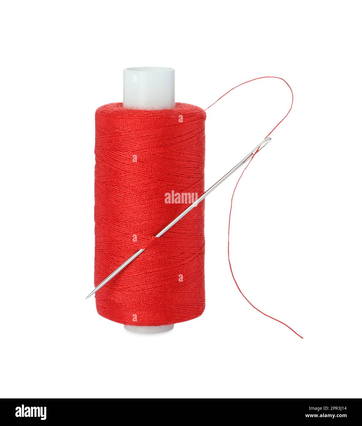 Spool of red sewing thread with needle isolated on white Stock Photo ...