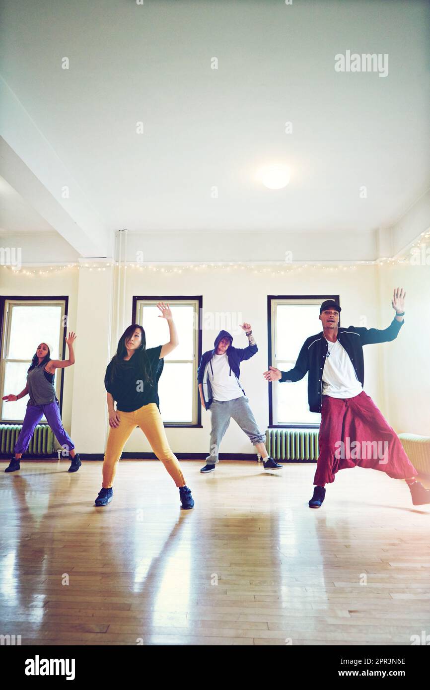 Life happens when you get moving. a group of young people dancing ...