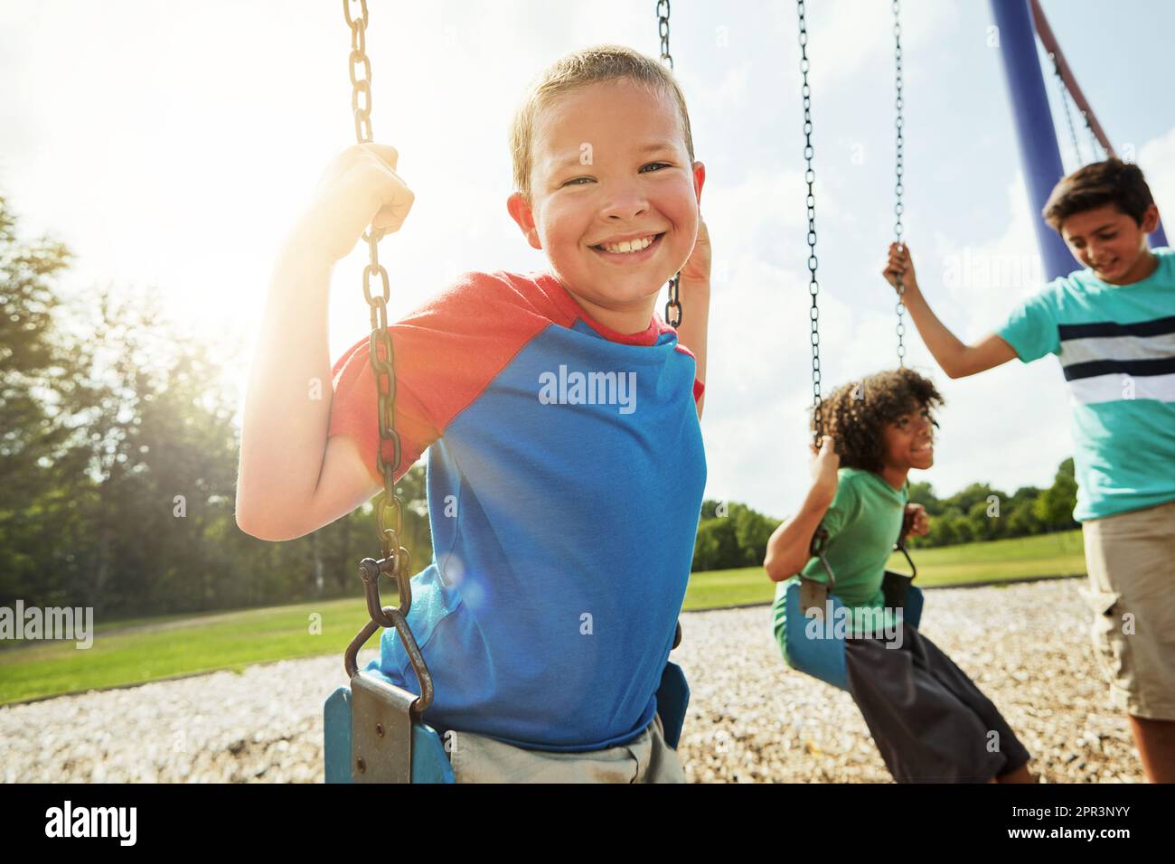 Hanging out with my best buddies. Portrait of a young boy playing on a ...