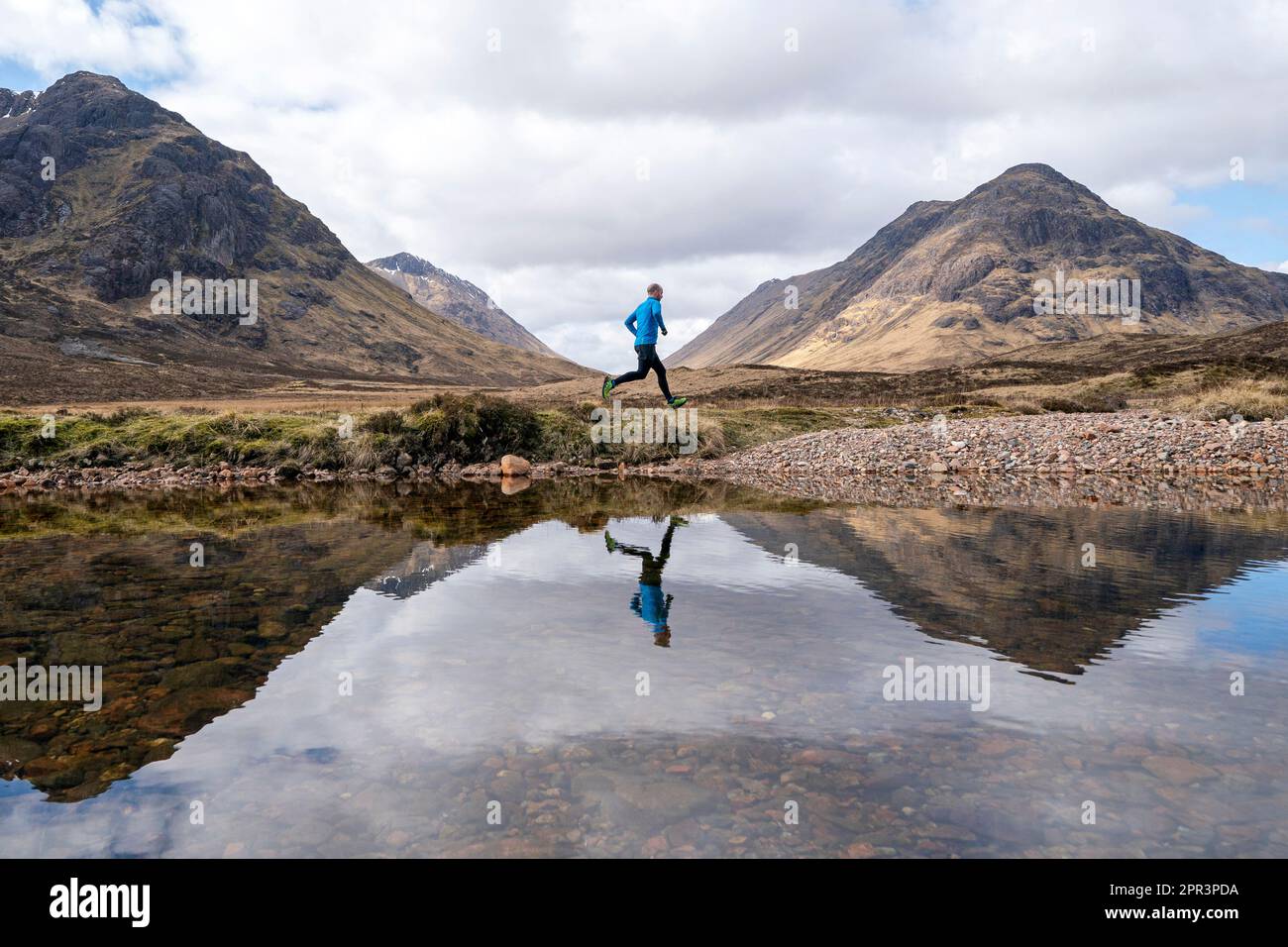 Author Chris Carse Wilson, from Newport, Fife, runs in Glen Coe in the ...