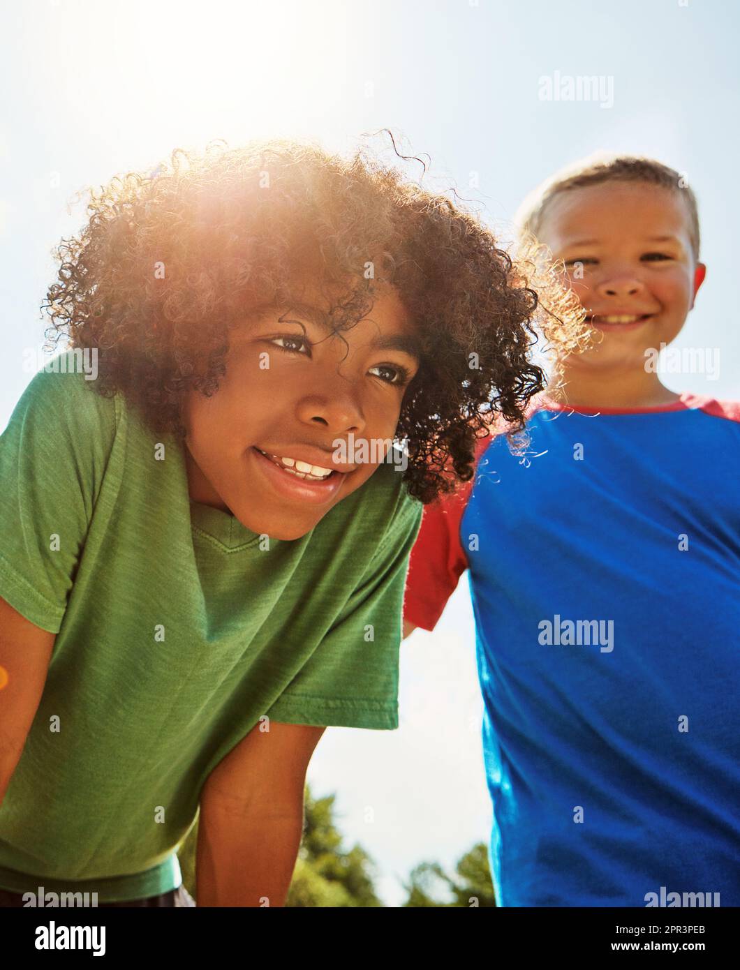 The coolest kids on a hot summers day. two happy young friends hanging ...
