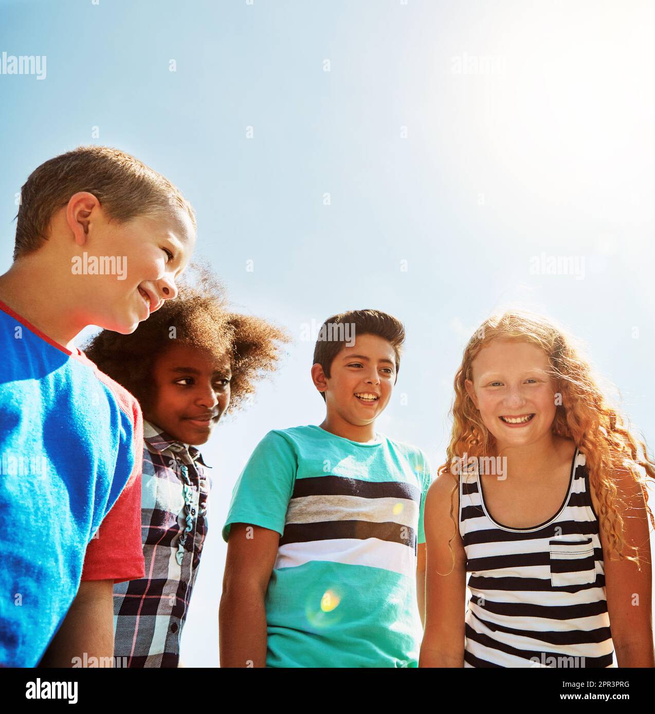 Summer days bring out the bests smiles. Portrait of a group of diverse ...