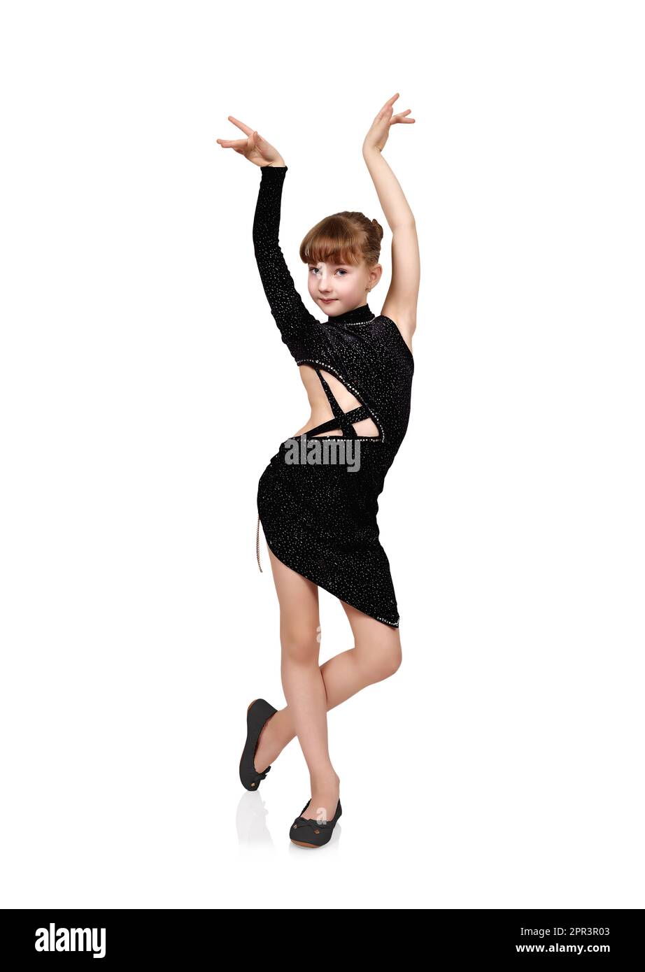 little girl dancing latin dances on a white background Stock Photo - Alamy