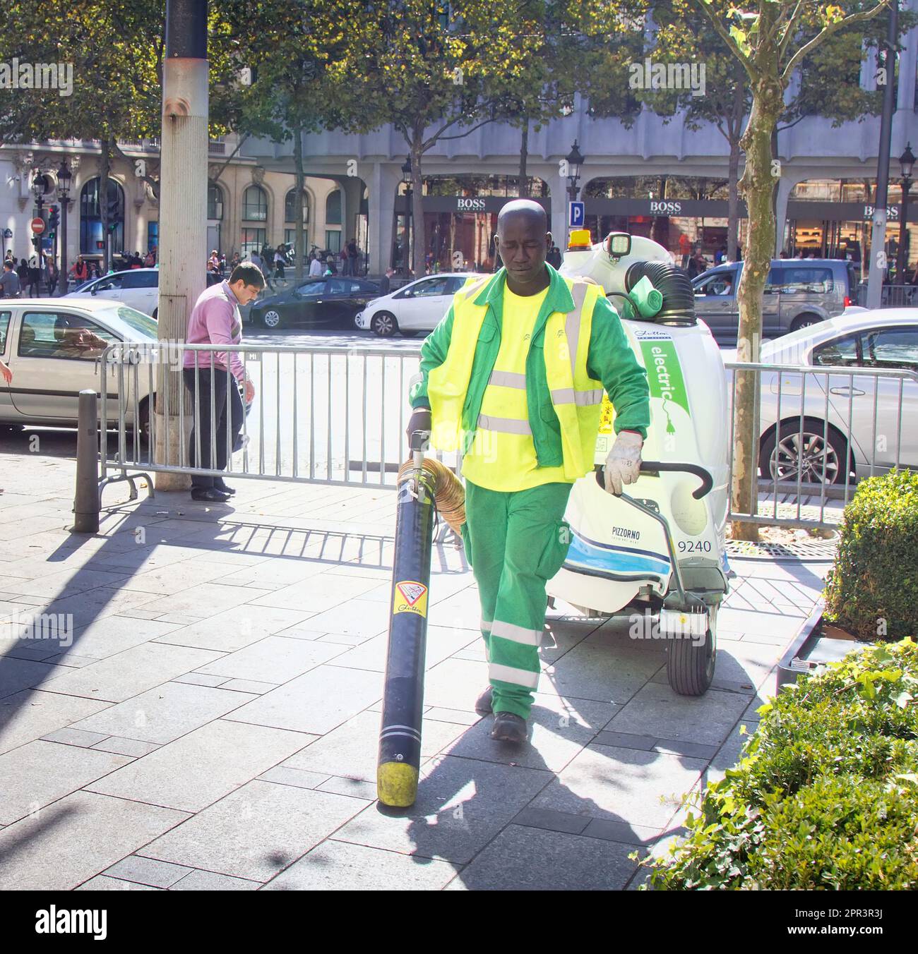 Paris, France - September 23, 2017: process of cleaning streets with a ...