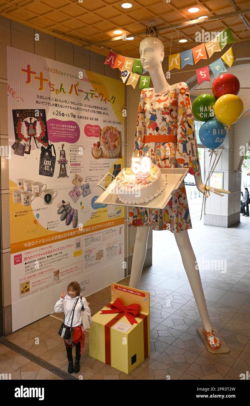 Nana-chan, a fashionable giant mannequin stands in front of the Meitetsu Department store in ...