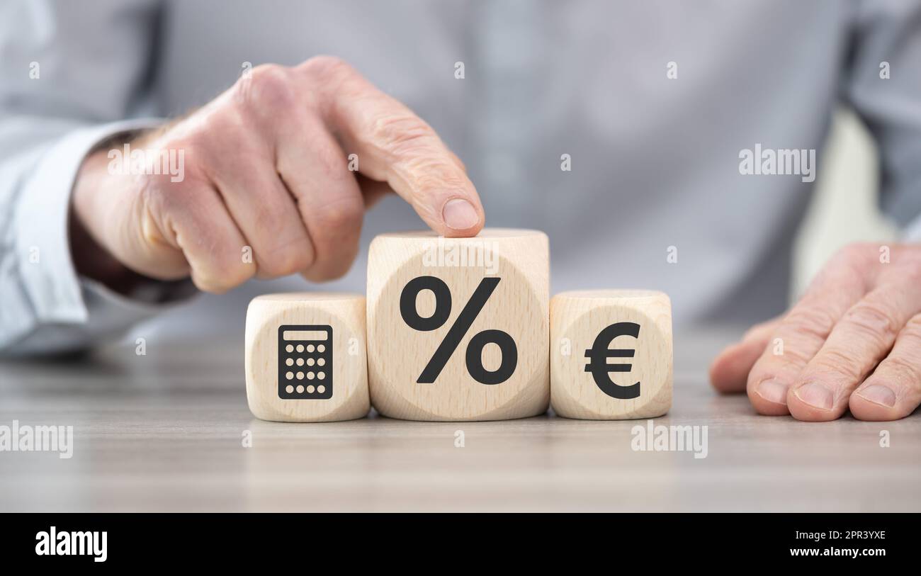 Wooden blocks interest rates hi-res stock photography and images - Alamy