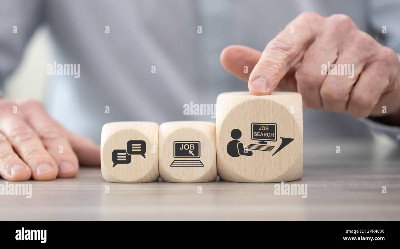 Wooden blocks with symbol of job search concept Stock Photo - Alamy