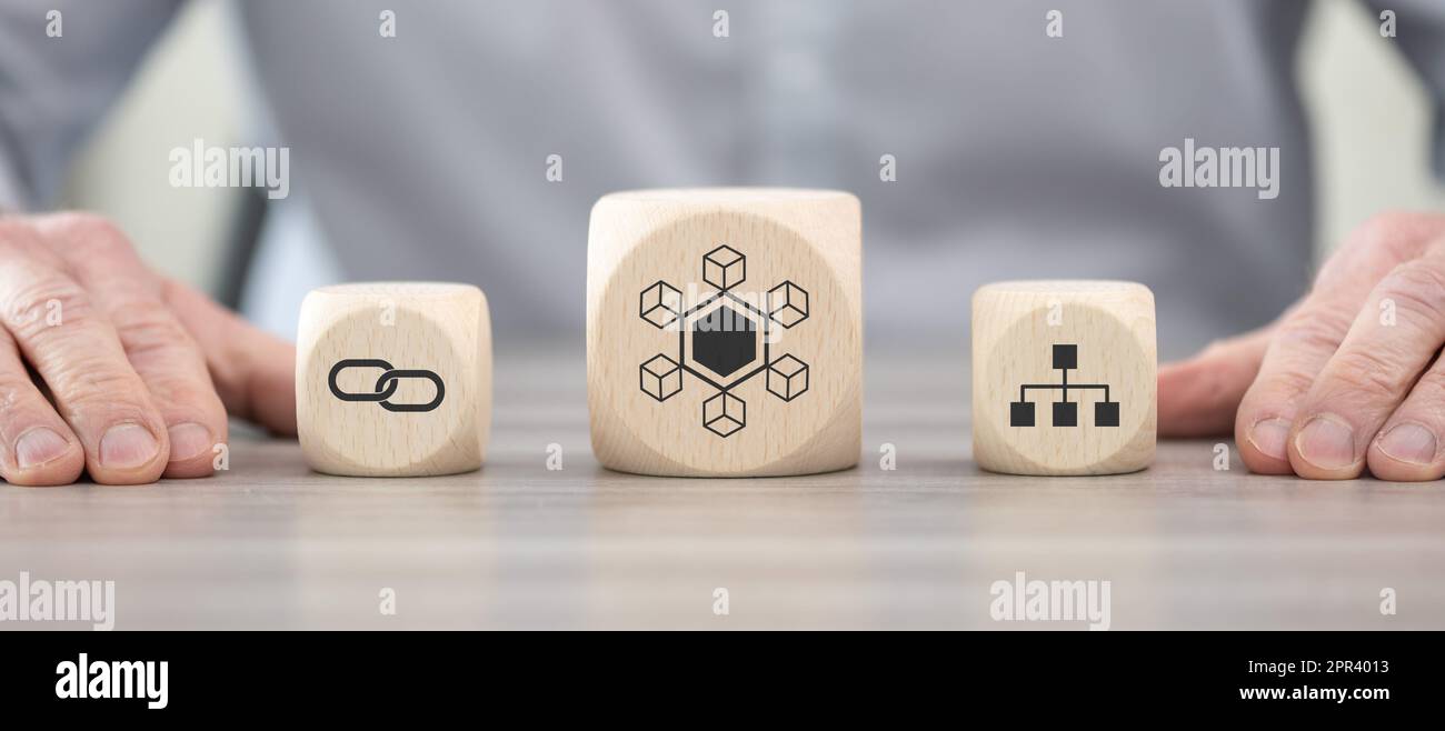 Wooden blocks with symbol of blockchain concept Stock Photo - Alamy