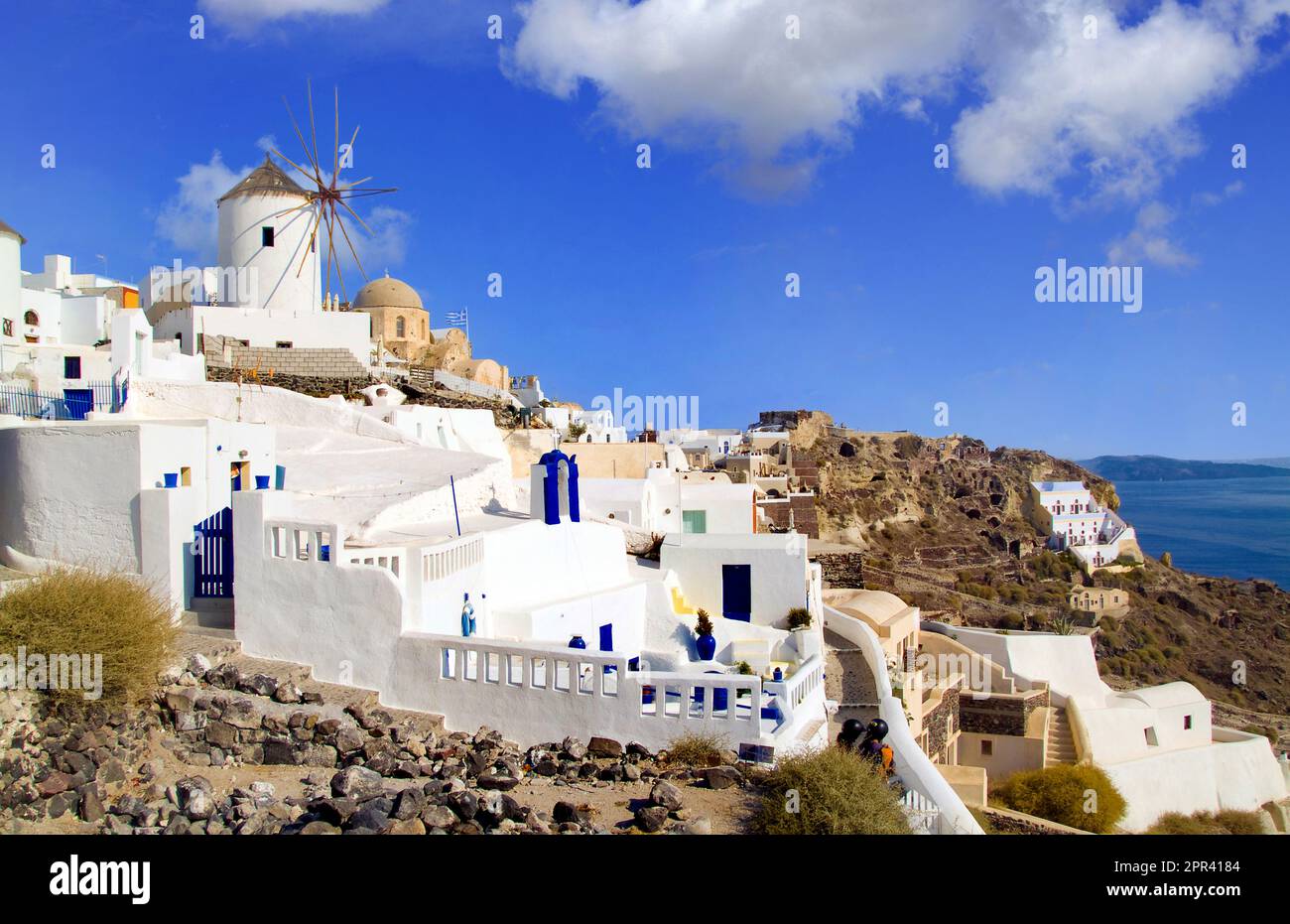 Santorini Greece and the beautiful white buildings on the mountain ...