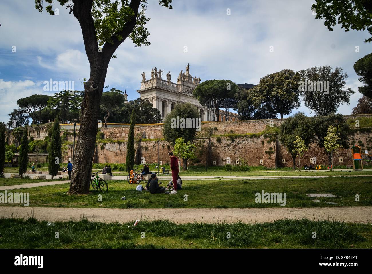 People in a public park near Basilica San Giovanni in Laterano, Rome ...