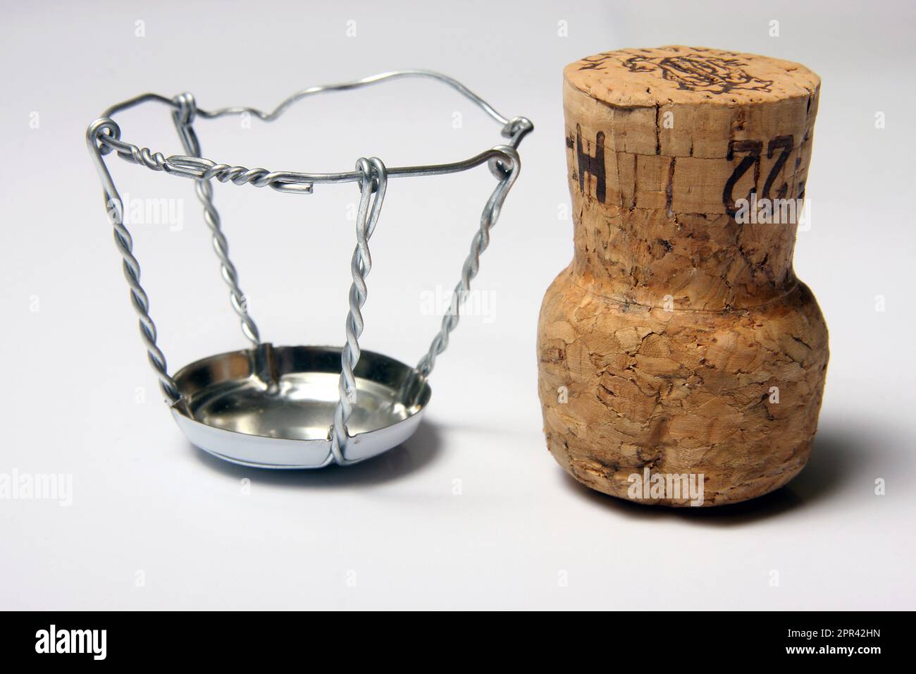 Champagne cork with muselet and muselet cap Stock Photo - Alamy