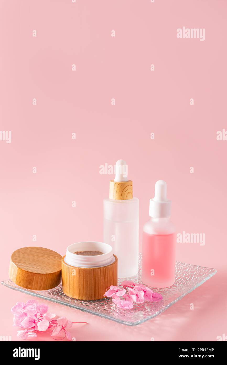 A set of comic organic skin care products for the face and body stand ...