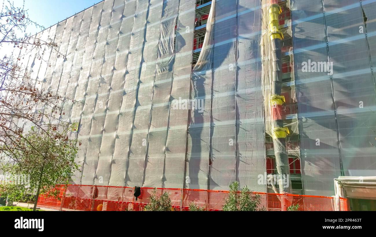 A scaffold provides support for building structures during construction ...