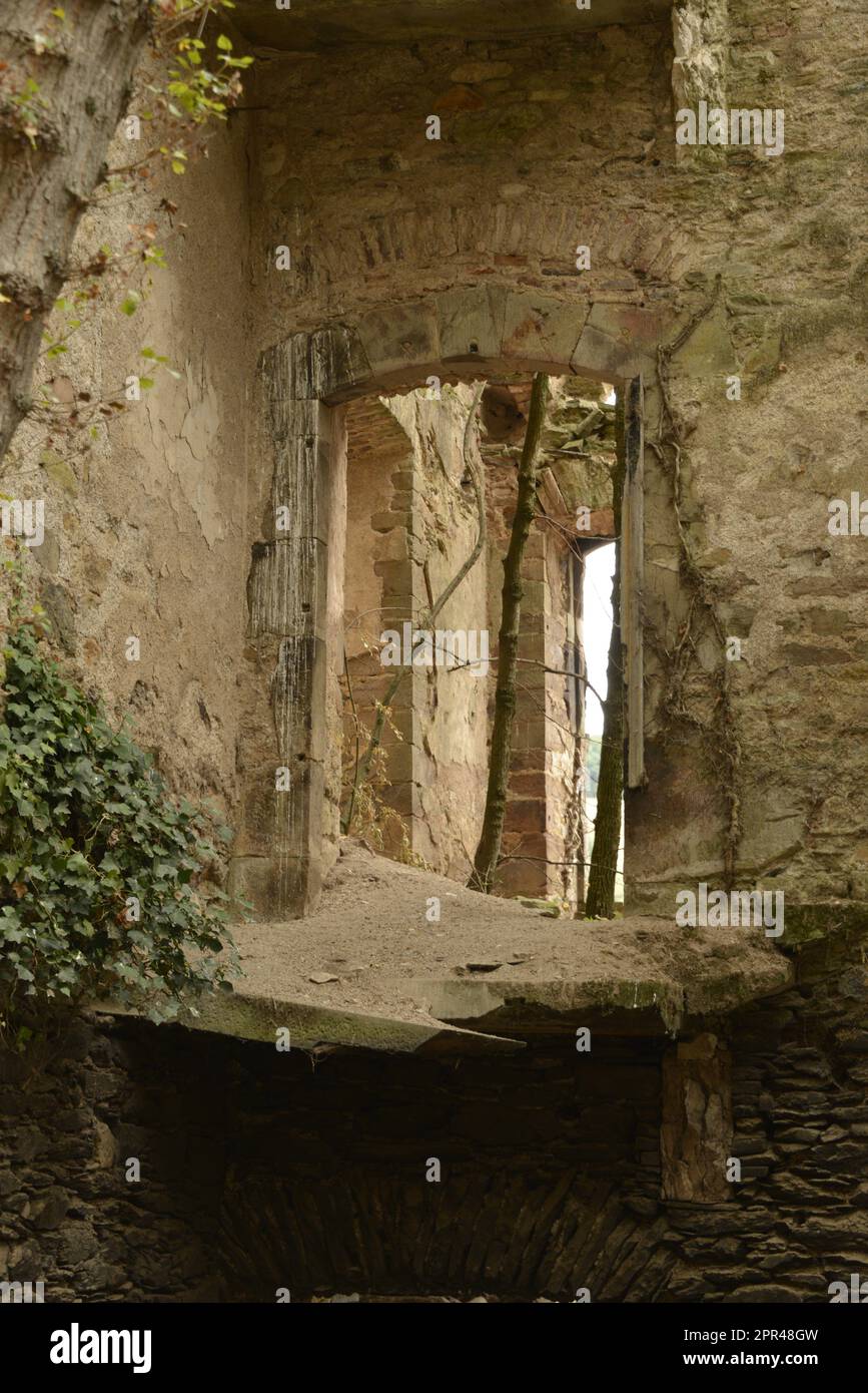 Abandoned medieval stone window archway surrounds Stock Photo - Alamy