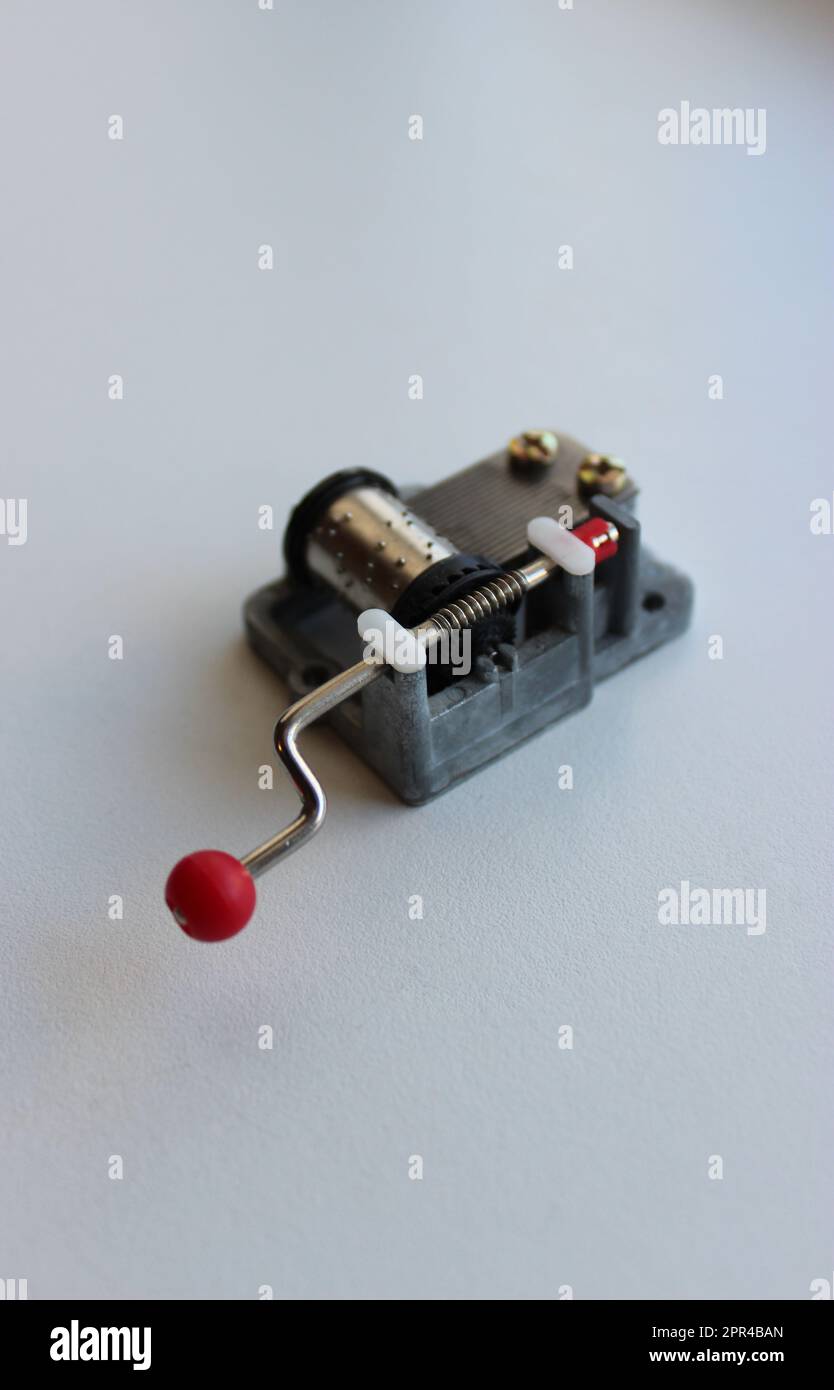 Hand Cranked Music Box On White Surface Vertical Stock Photo Stock ...