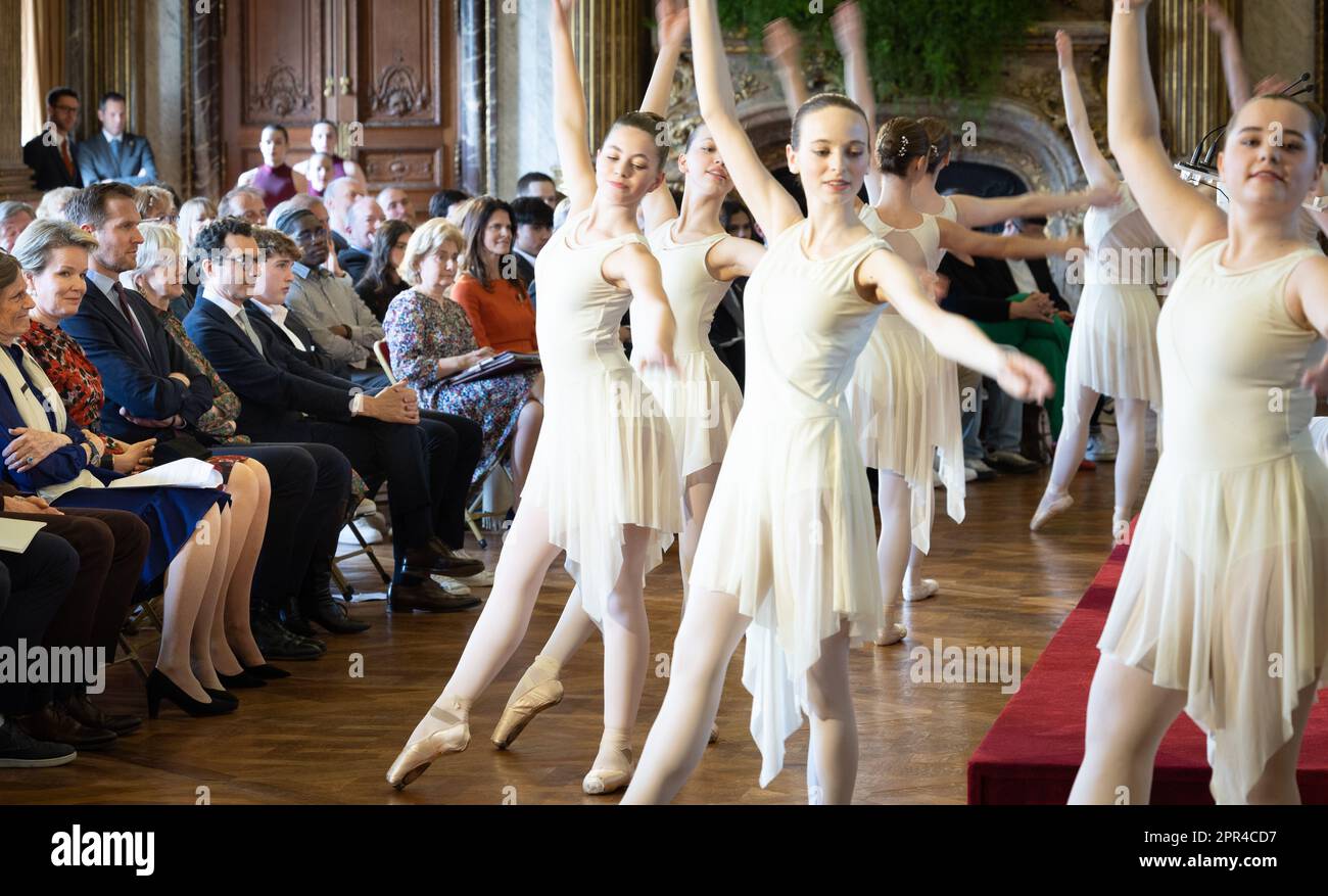 Queen Mathilde of Belgium looks at the presentation of the Queen ...