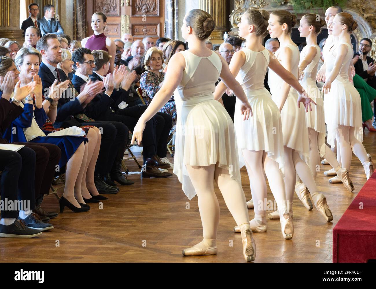 Queen Mathilde of Belgium looks at the presentation of the Queen ...