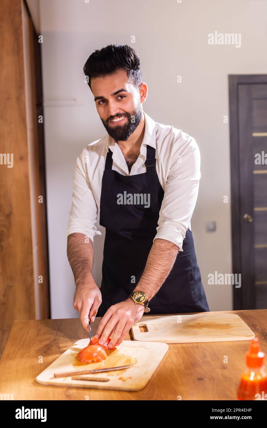 Chef cooking caprese salad in restaurant kitchen Stock Photo - Alamy