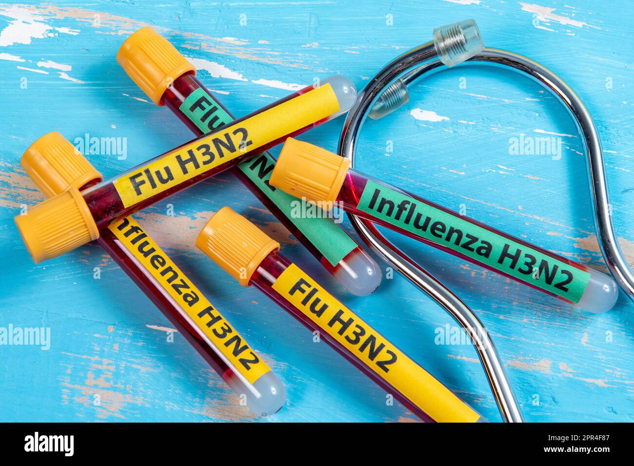 vacuum vials for blood collection written FLU H3N2 in reference to the ...