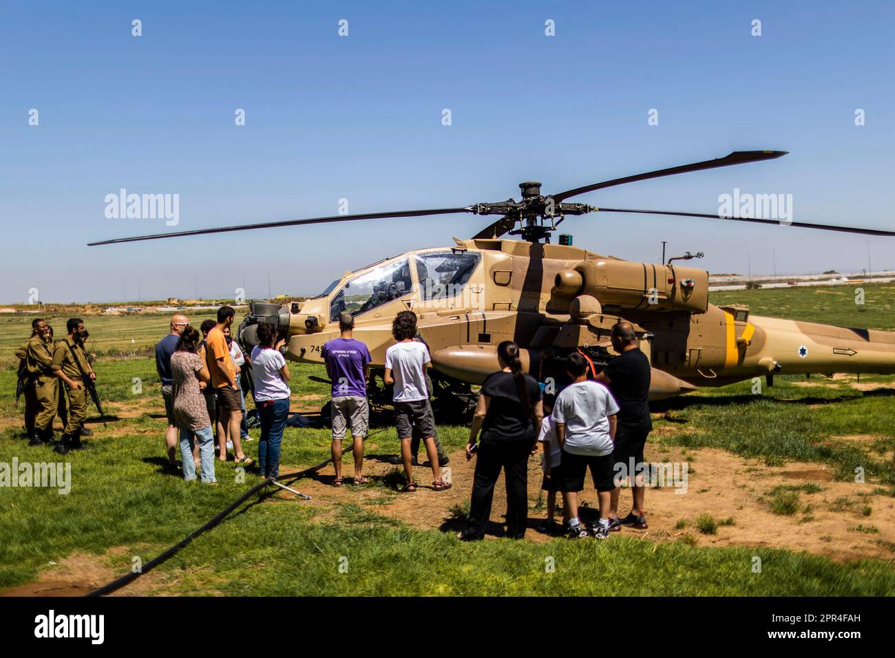 Netanya, Israel. 26th Apr, 2023. People gather around an Israeli ...