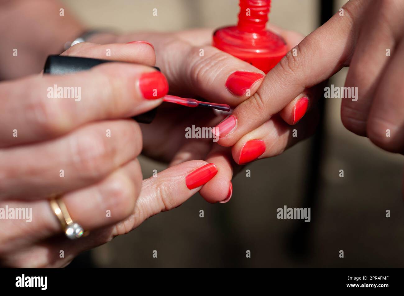 Fingernail painting mum helping daughter with painting her fingernails ...