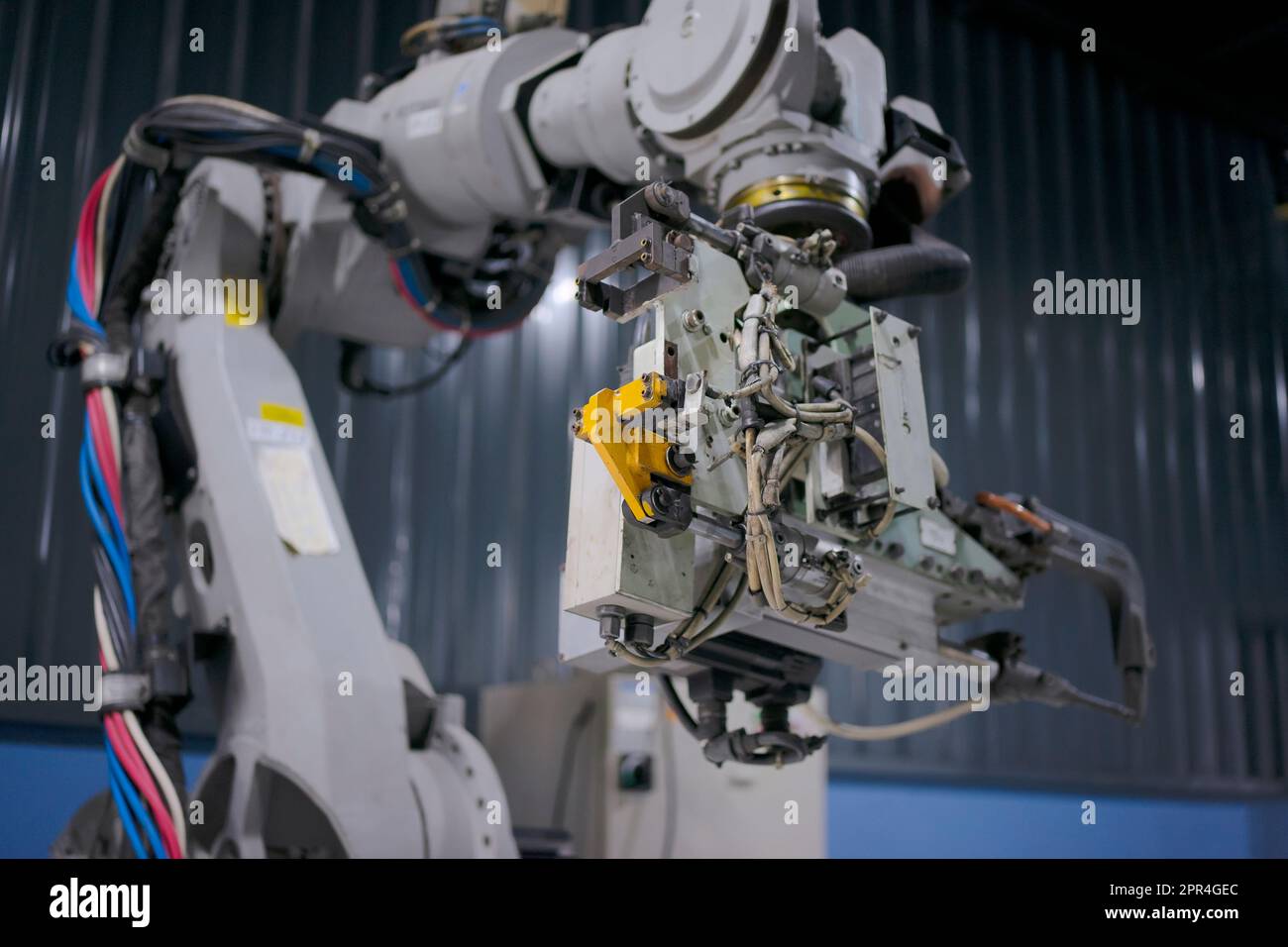 Engineer work at robotic arm factory. Technology and engineering concept Stock Photo - Alamy