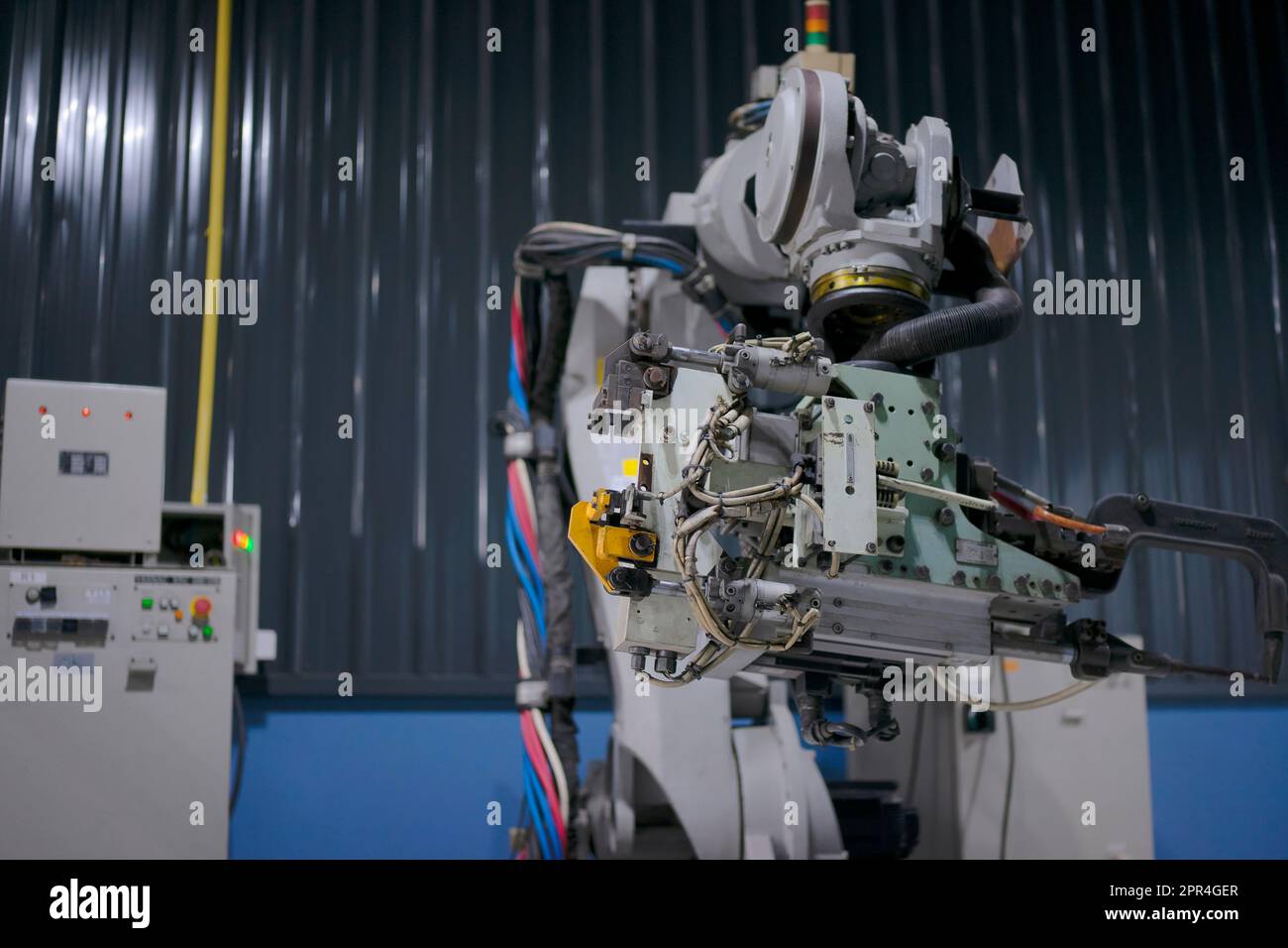 Engineer work at robotic arm factory. Technology and engineering concept Stock Photo - Alamy