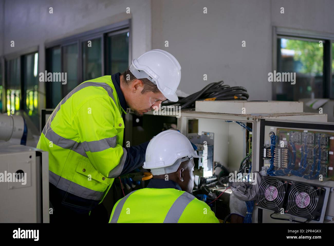 Engineer work at robotic arm factory. Technology and engineering ...