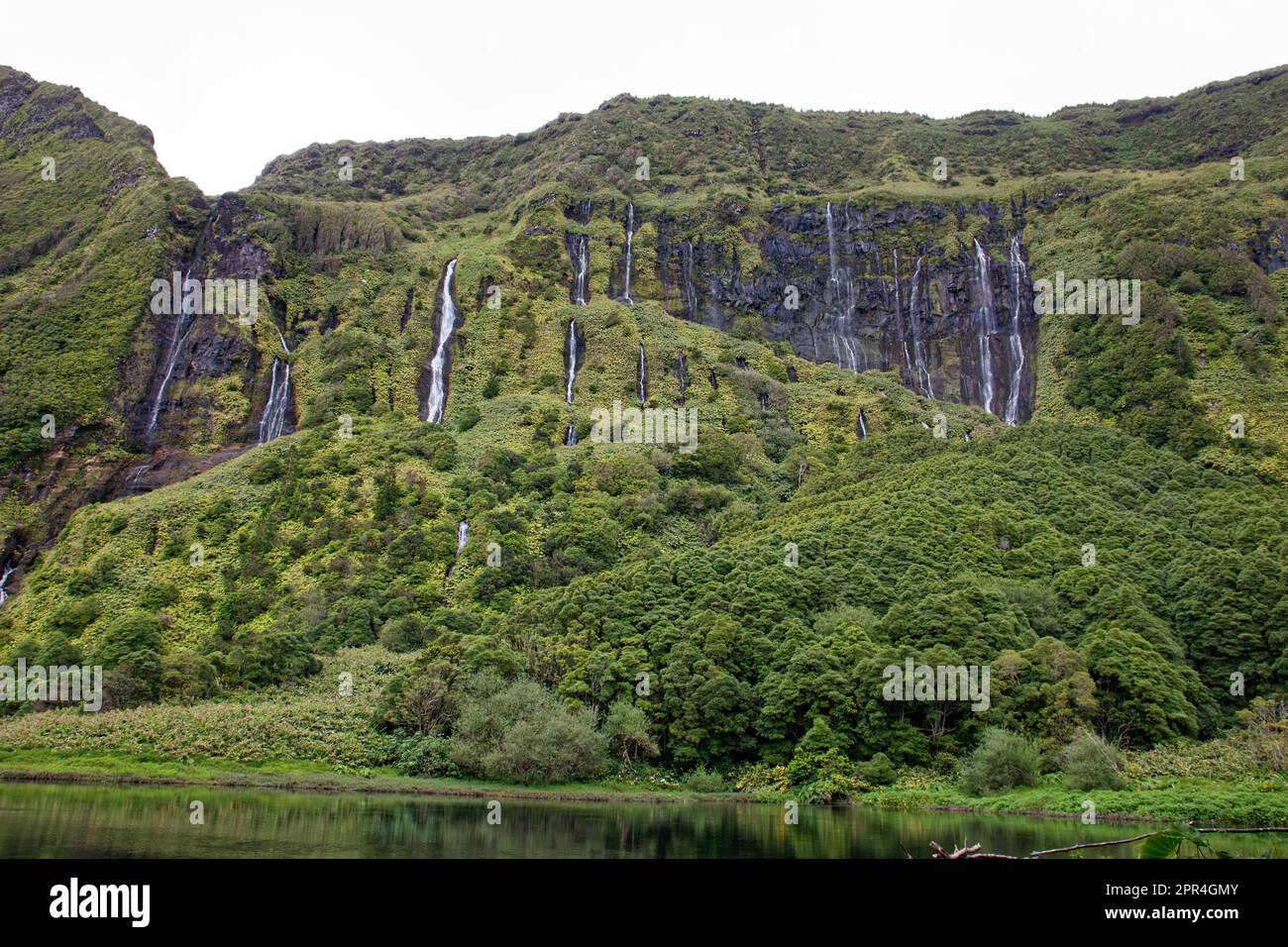 Panoramic view at the beautiful waterfalls of Poço Ribeira do Ferreiro ...
