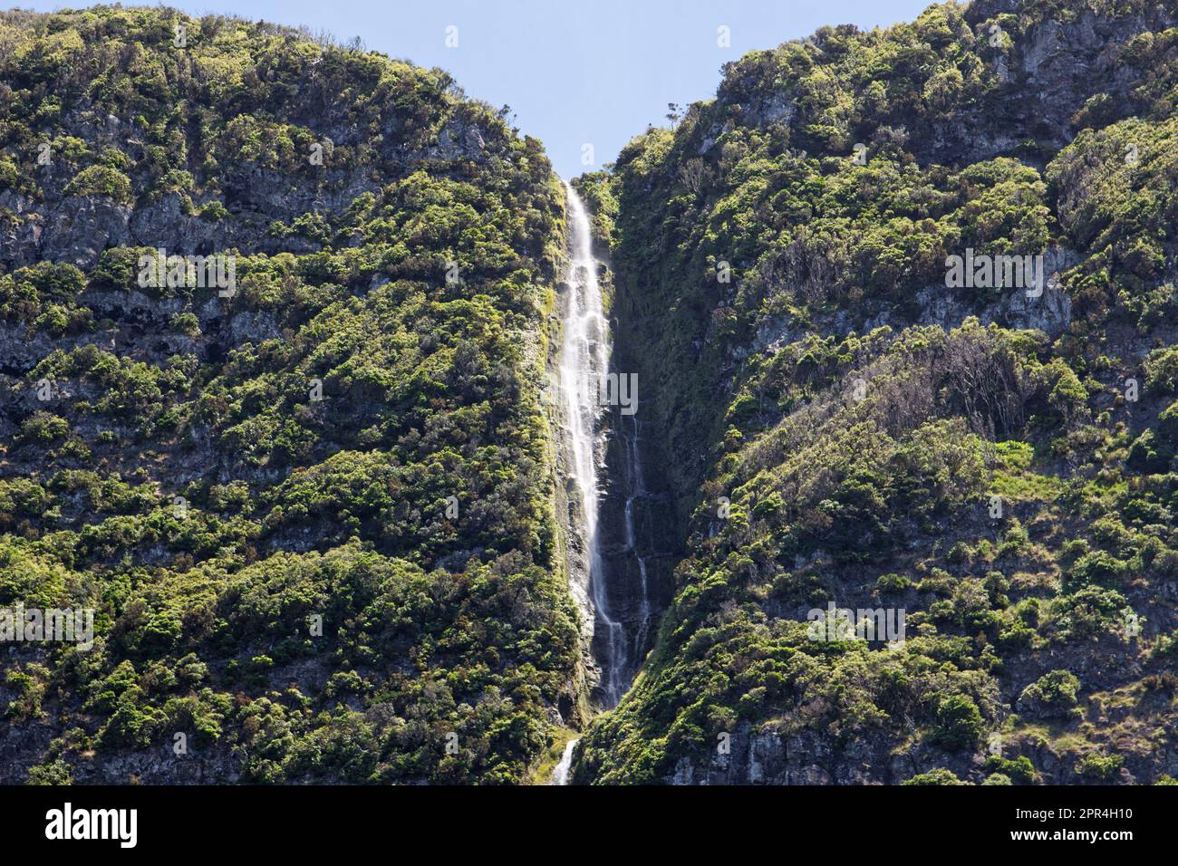 One of the many waterfalls near the town of Fajã Grande, Flores, Azores ...