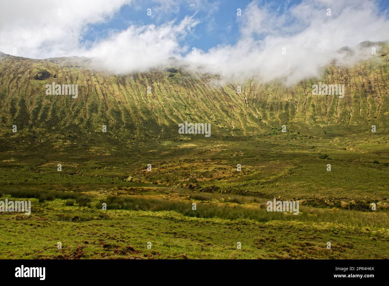 A panoramic view inside Caldeirão, the volcanic caldera of Corvo island ...