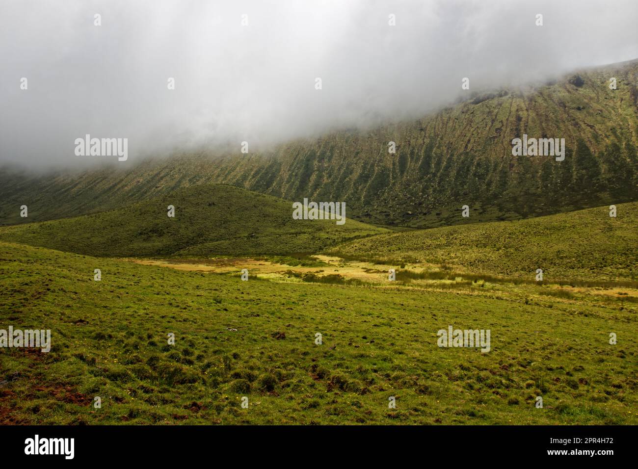 A panoramic view inside Caldeirão, the volcanic caldera of Corvo island ...