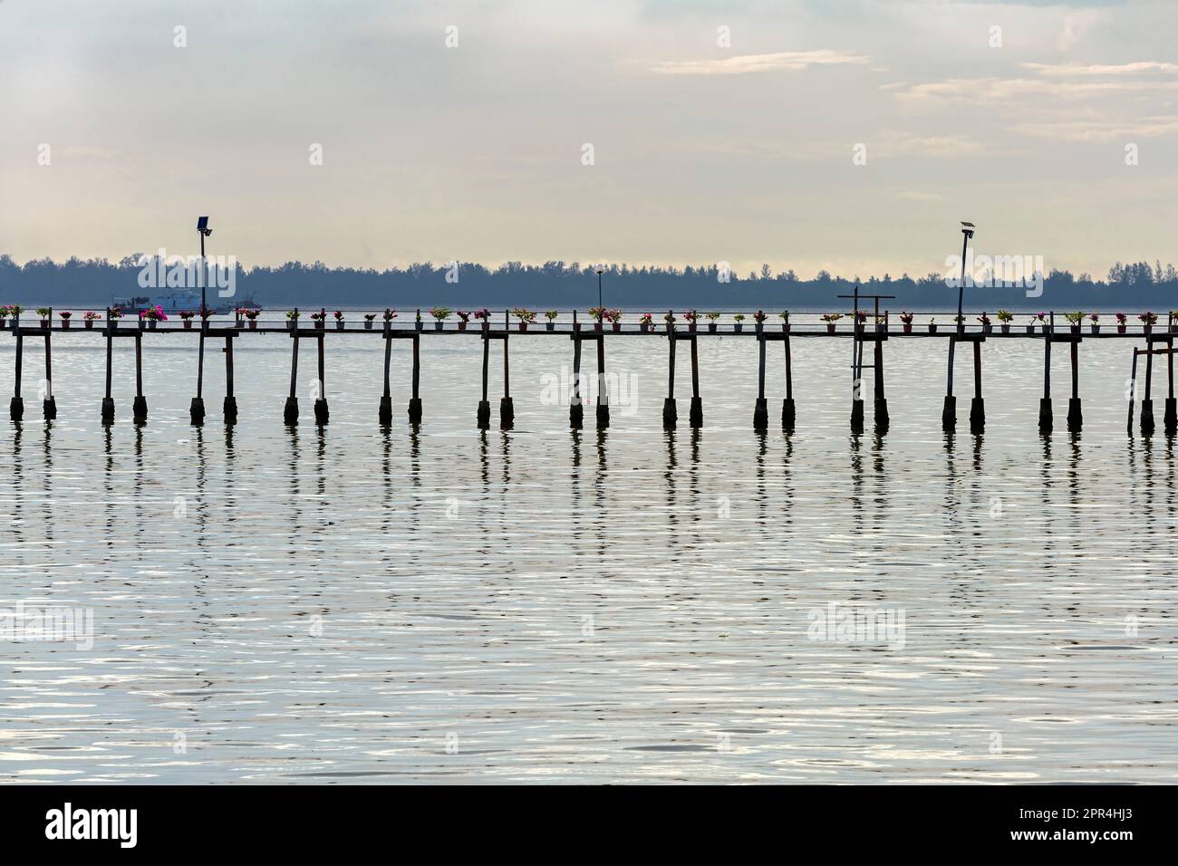 A long pier from a fishing village into the Pacific, Sandakan fishing ...