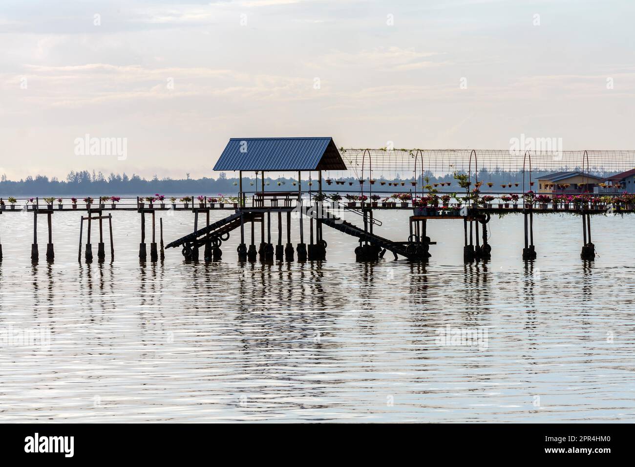 A long pier from a fishing village into the Pacific, Sandakan fishing ...
